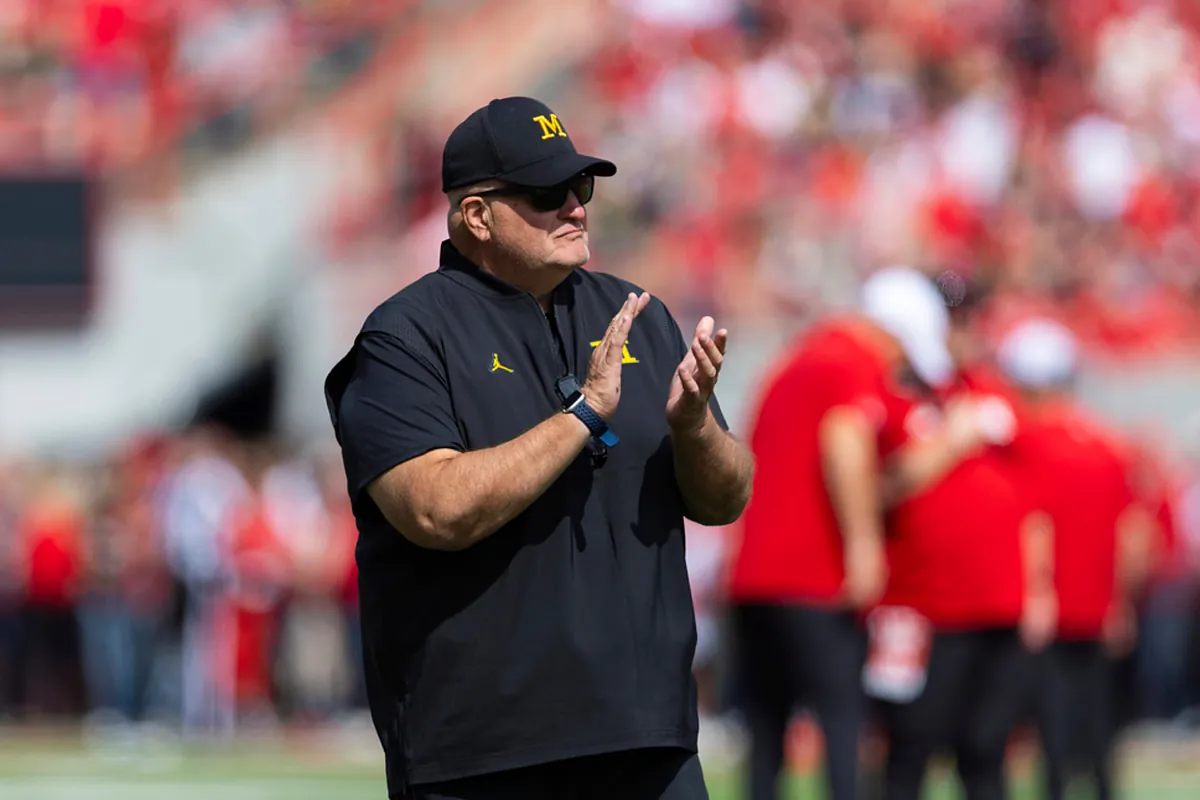 Who is Biff Poggi, Michigan's interim head coach after the firing of ...