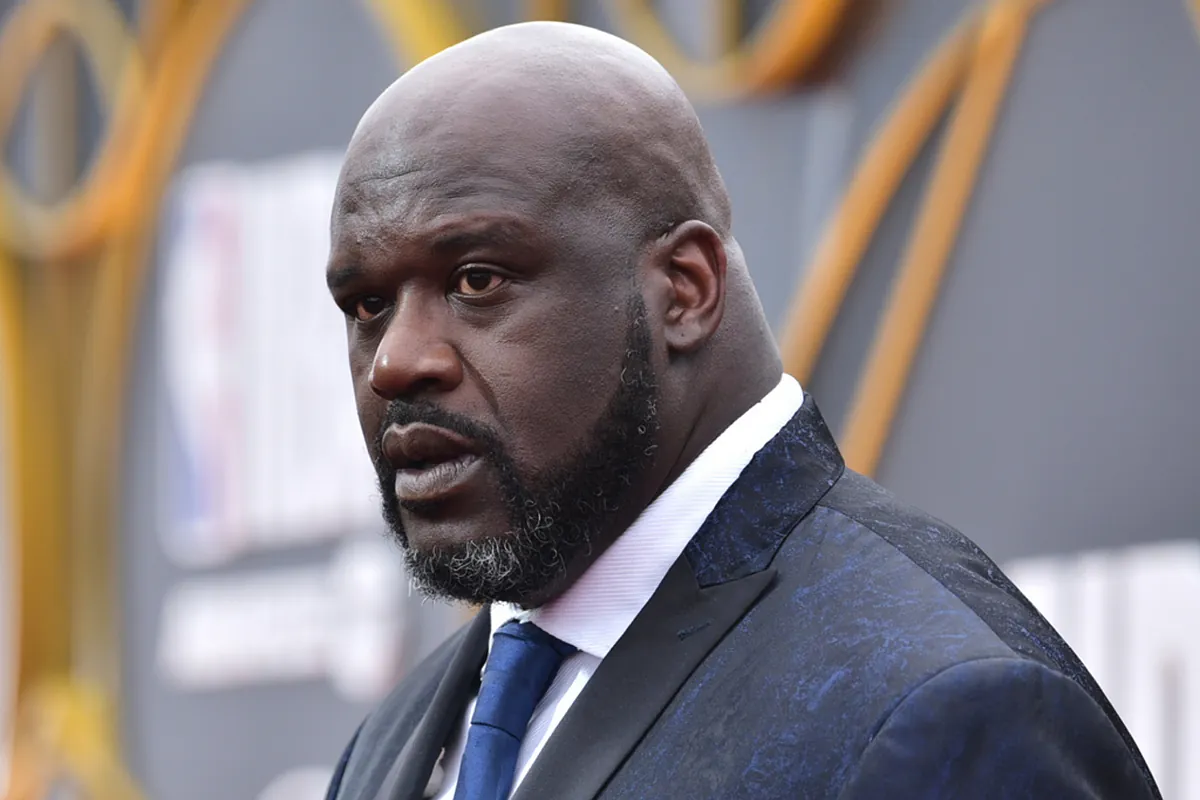 A giant helping another achieve his dream: Shaquille O'Neal helps a ...