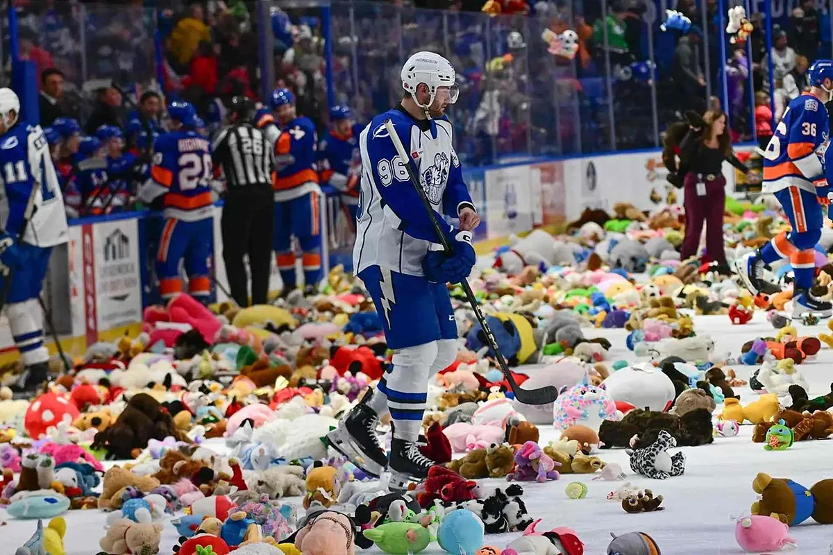 A storm of stuffed animals as Syracuse Crunch fans fill the ice with ...