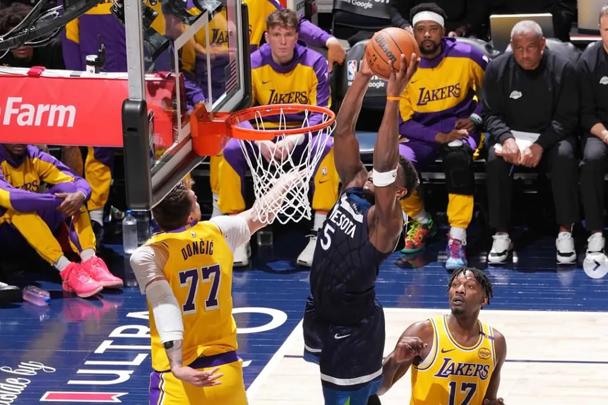 Anthony Edwards dunks on Luka Doncic and gives him a mean stare before ...