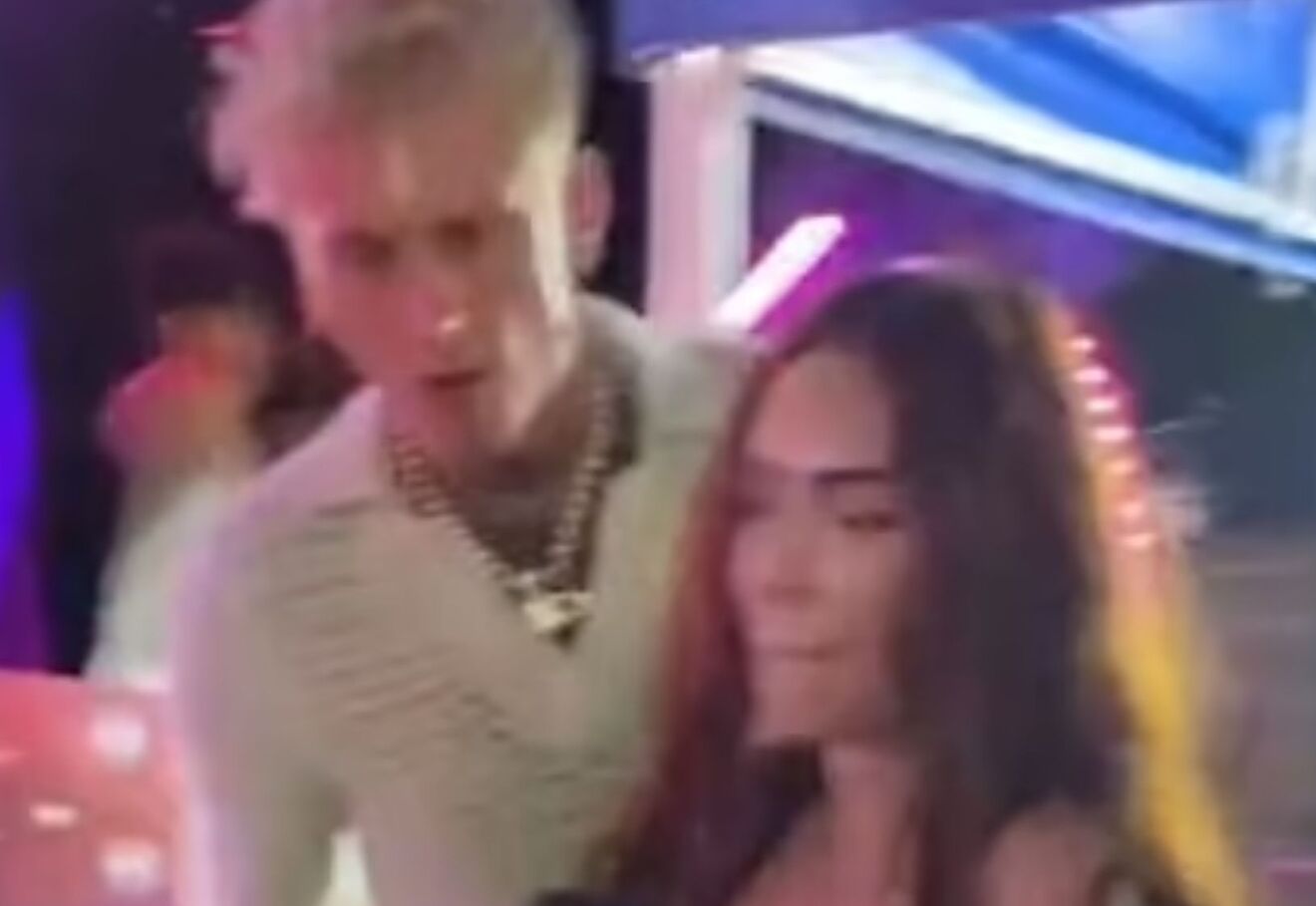 Megan Fox sent into barrier after Machine Gun Kelly attacked at fair ...