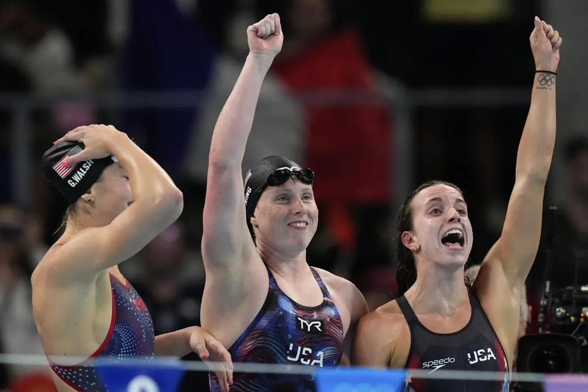 Filke and the 4x100 freestyle team set two world records to lift the U ...